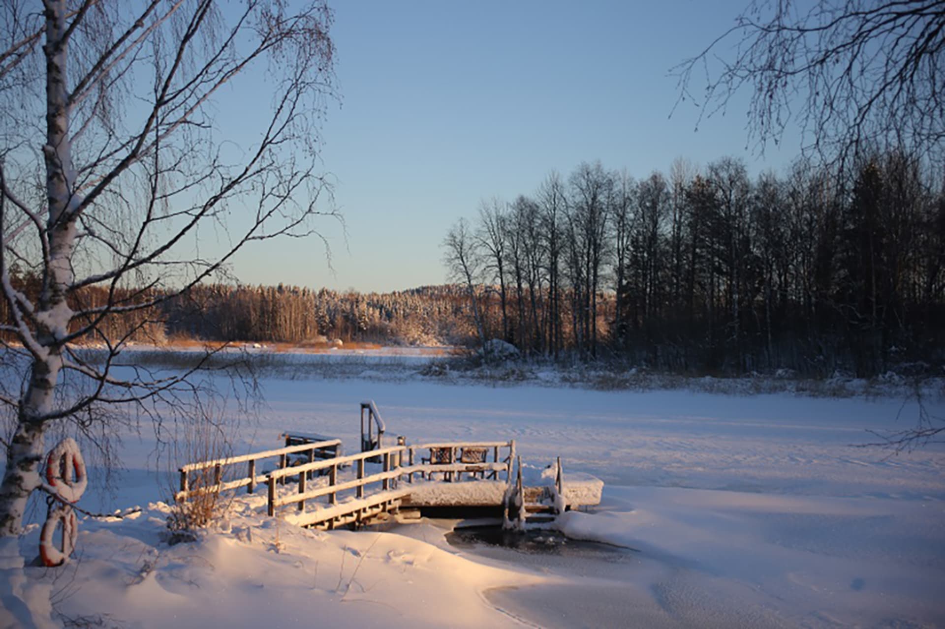 Ice swimming in Lake Saimaa on Tuesdays at the lakeside sauna of ...